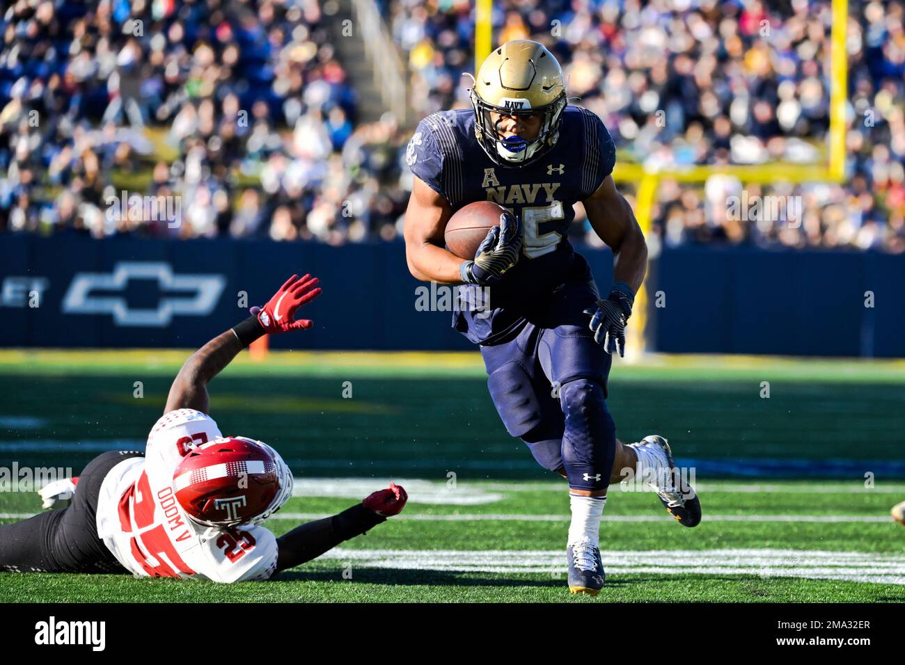 Navy fullback Daba Fofana, right, runs the ball for a touchdown during ...