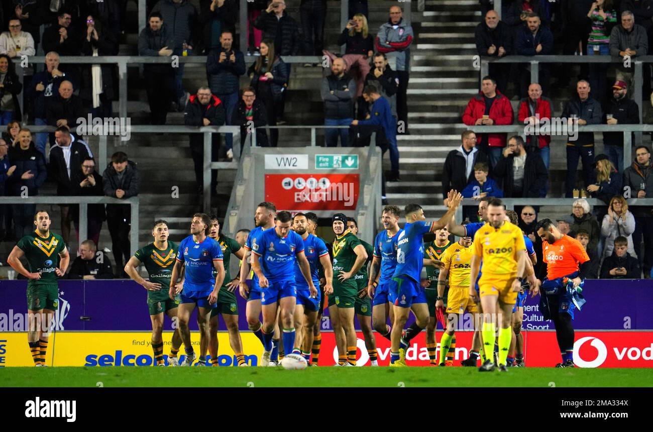 Italy's players celebrate a try during the Rugby League World Cup match ...
