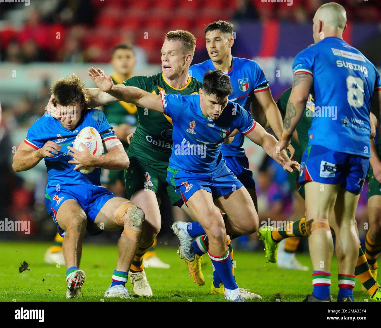 Italy's Luke Polselli, left, breaks away from a challenge by Australia ...