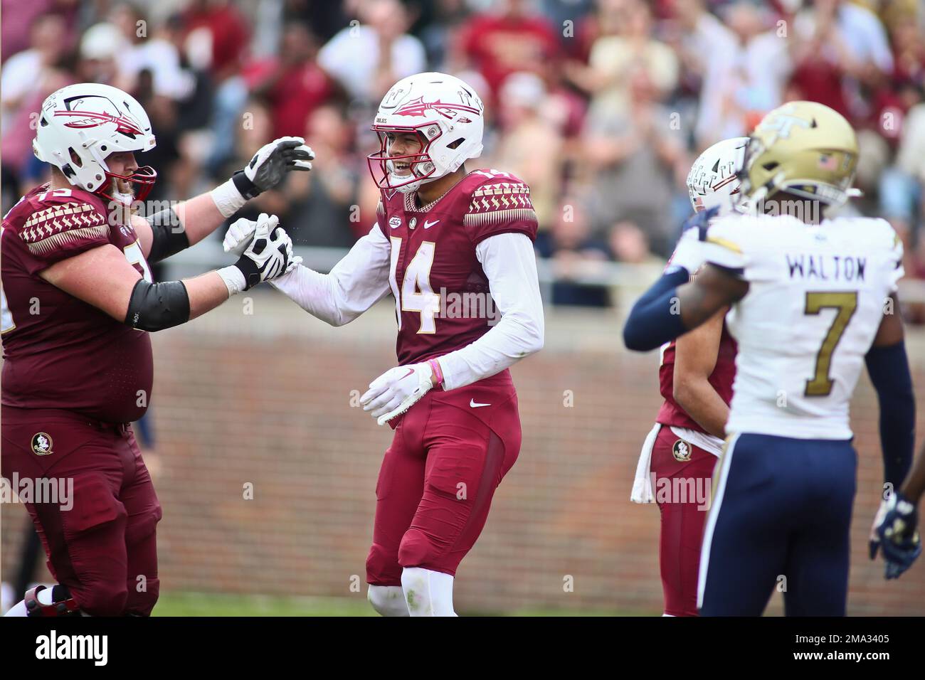 Florida State offensive lineman Dillan Gibbons (75) congratulates wide ...