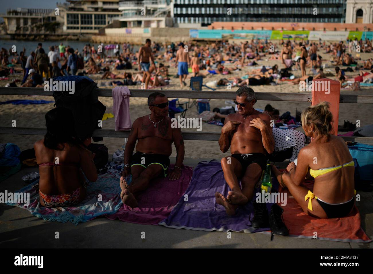 Beachgoers enjoy the sun and high temperatures in Marseille, southern ...