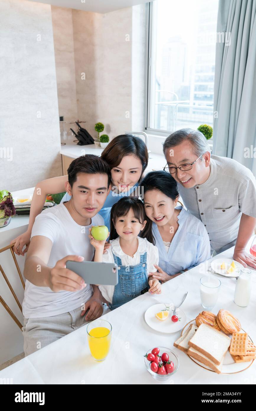 Happy family meals Stock Photo - Alamy