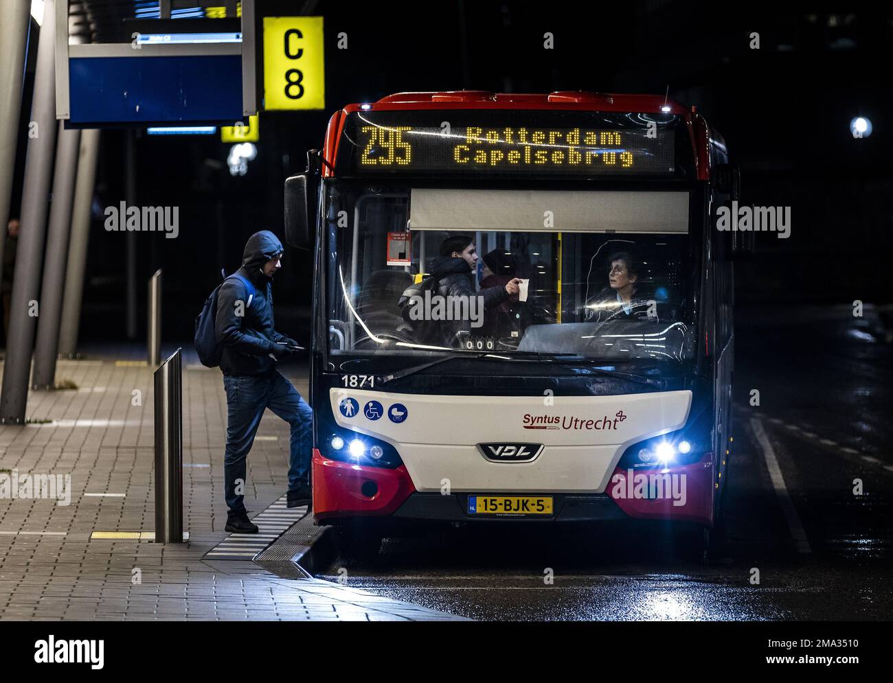 UTRECHT - Passengers board the bus at the bus station of Utrecht ...