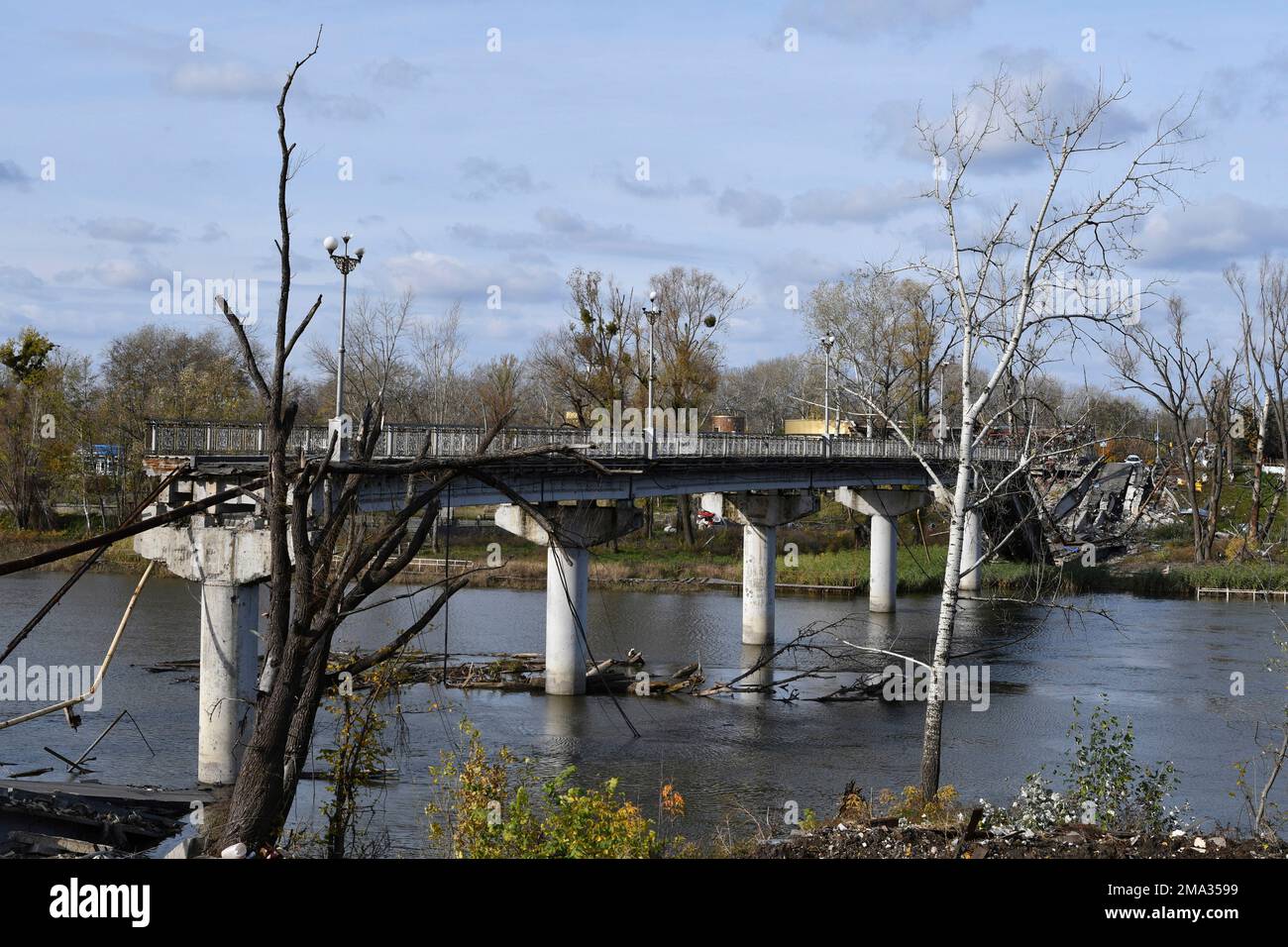 A view of a destroyed bridge across Siverskyi-Donets river in the ...