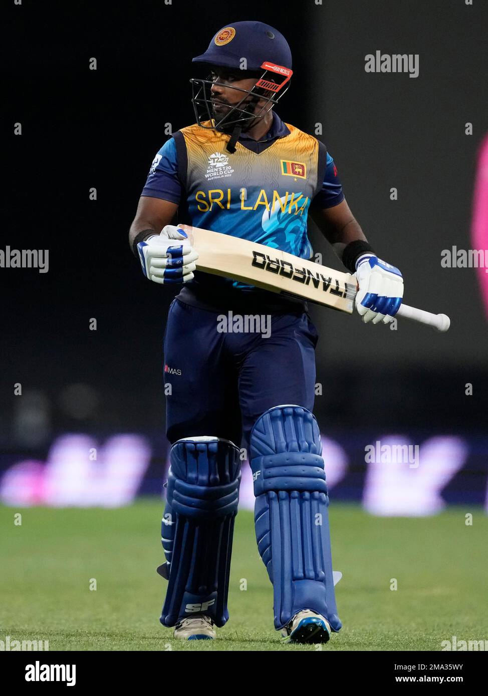 Sri Lanka's Charith Asalanka walks off after losing his wicket to New Zealand during their T20 ...