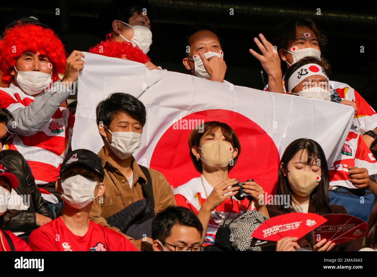 Japanese fans react ahead of the rugby international between the All ...