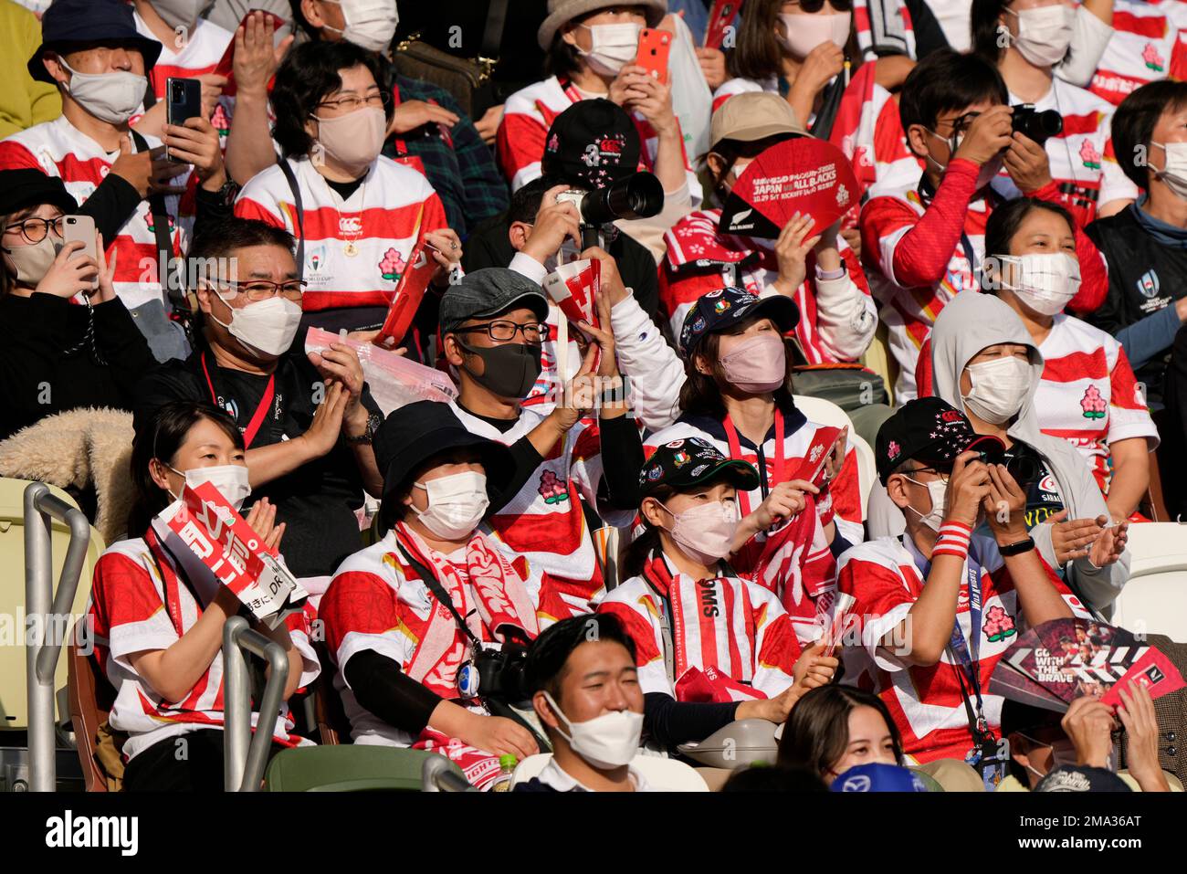 Japanese fans react ahead of the rugby international between the All ...