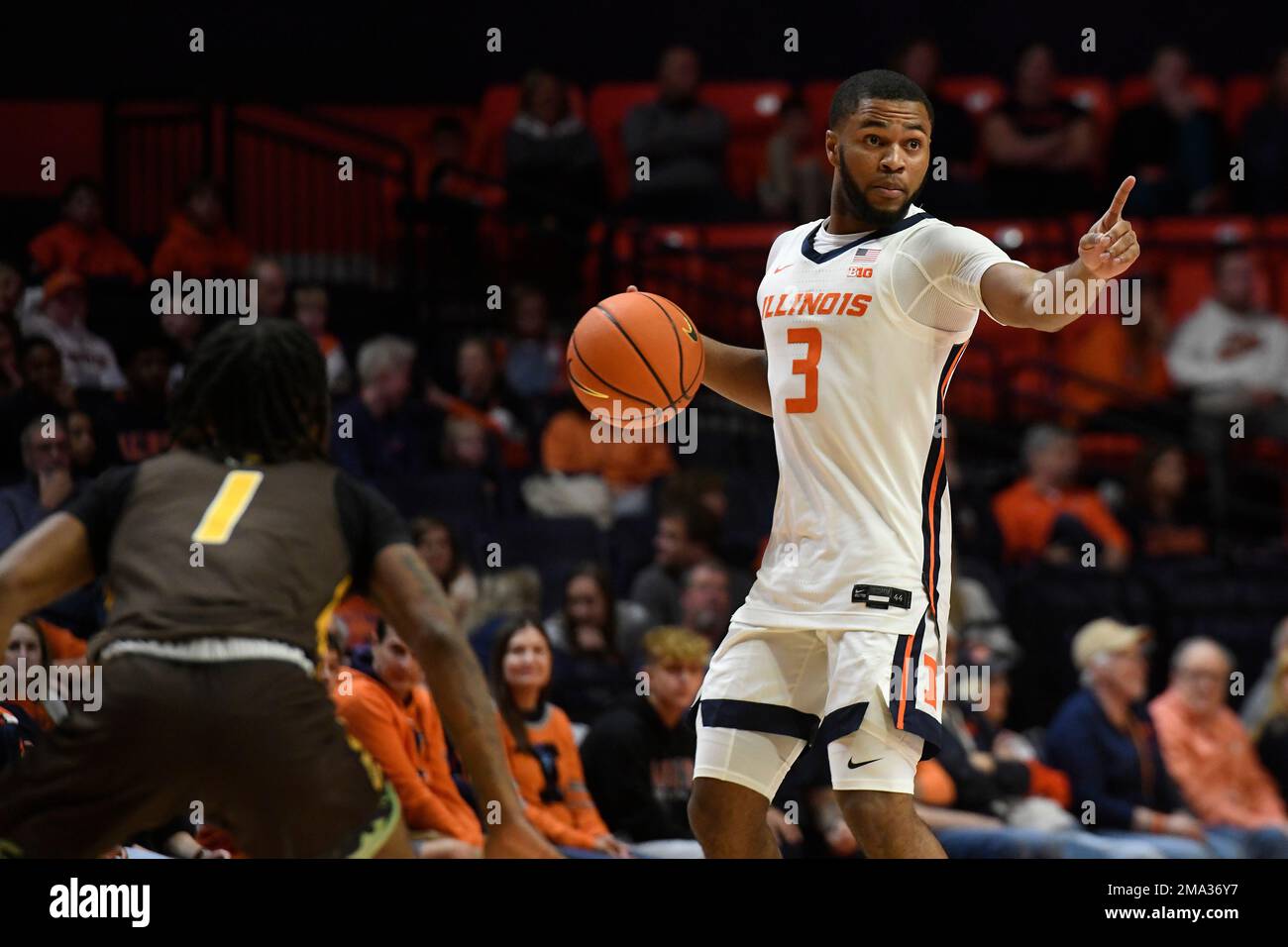 Illinois' Jayden Epps (3) signals as Quincy's Isaiah Foster (1) defends ...