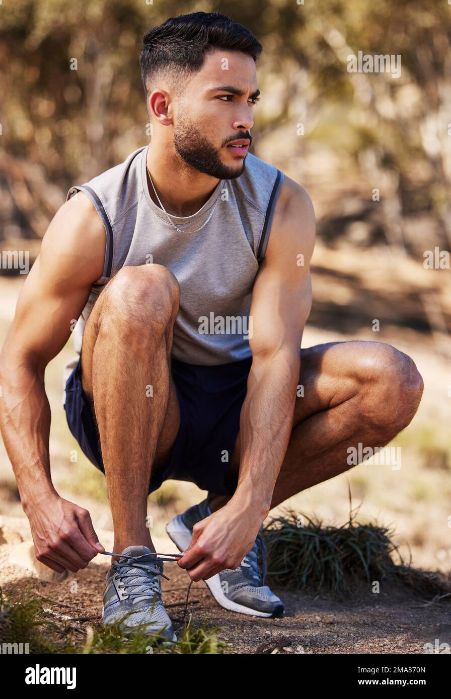 The path to success is clear. Full length shot of a handsome young man ...