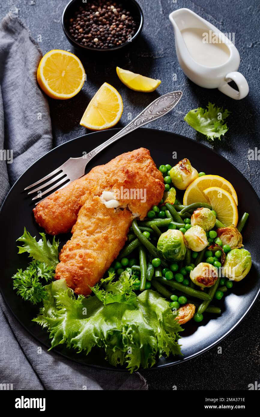 Crispy Beer Batter Cod Fish fillet with roast brussel sprouts, green ...