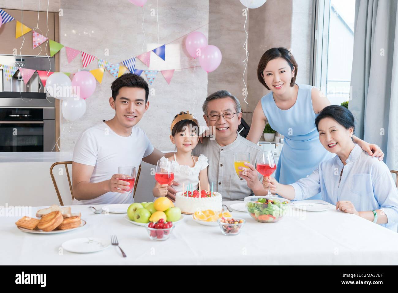 Happy multigenerational family sitting hi-res stock photography and ...