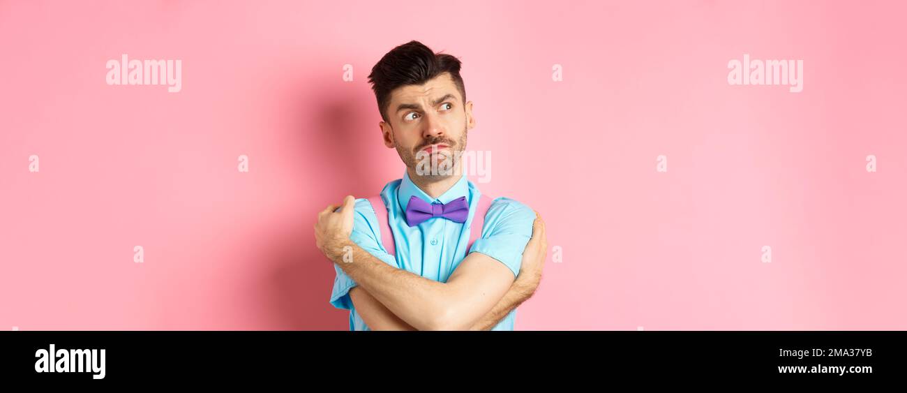 Timid guy feeling offended and lonely, embracing body, comforting ...