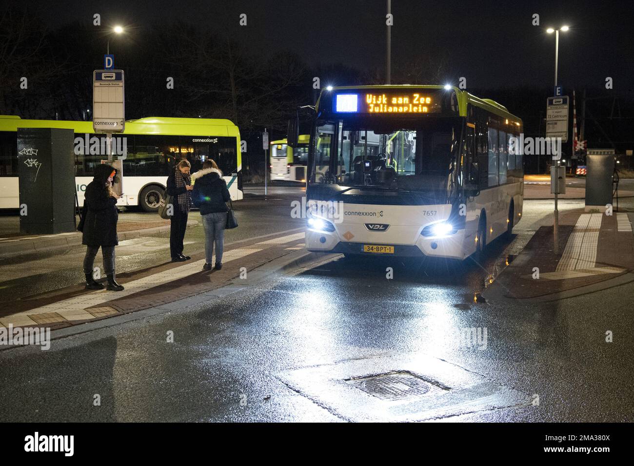 BEVERWIJK - Travelers at the bus station are waiting for their bus ...