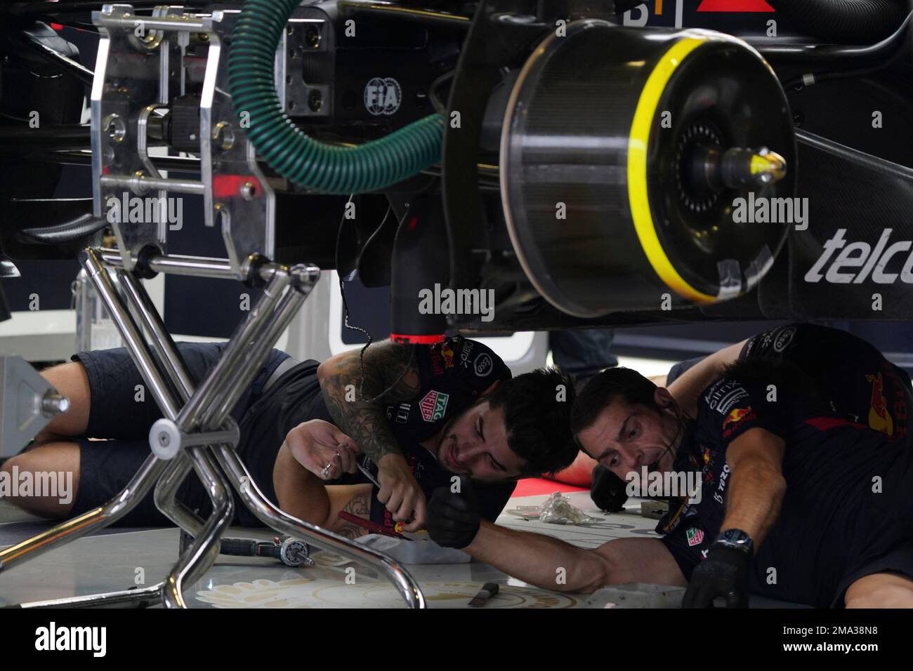 Red Bull driver Max Verstappen's race car is worked on by his mechanics ...
