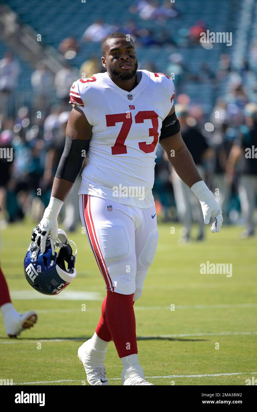 New York Giants offensive tackle Evan Neal (73) warms up before an NFL ...