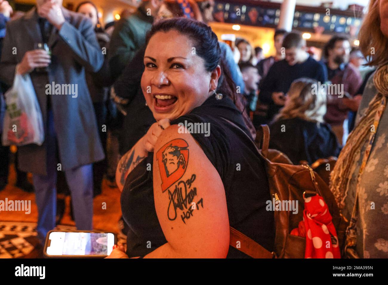 Fan displays her Denver Broncos tattoo during an event during an event at the Barrowboy and ...