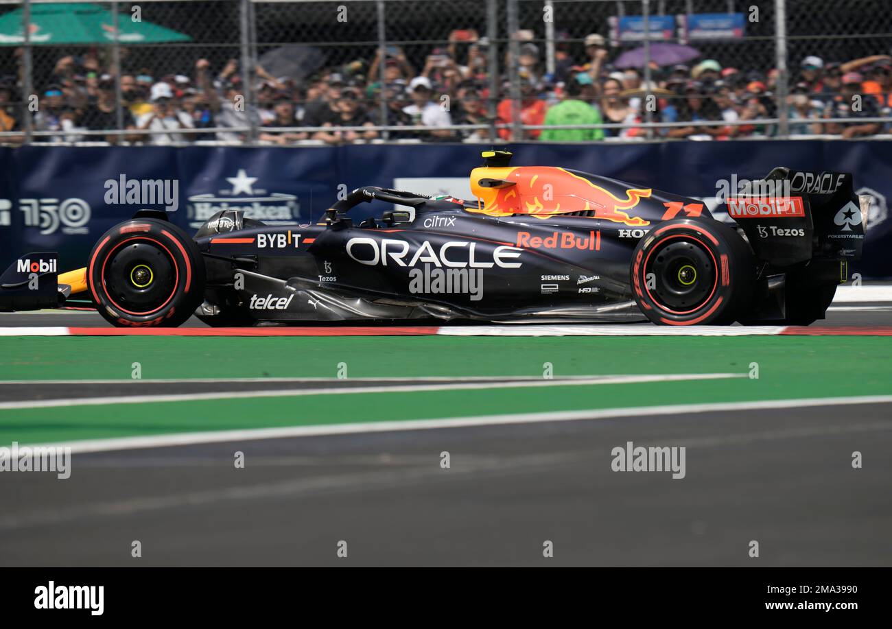 Red Bull driver Sergio Perez, of Mexico, drives his race car during a practice run of the ...