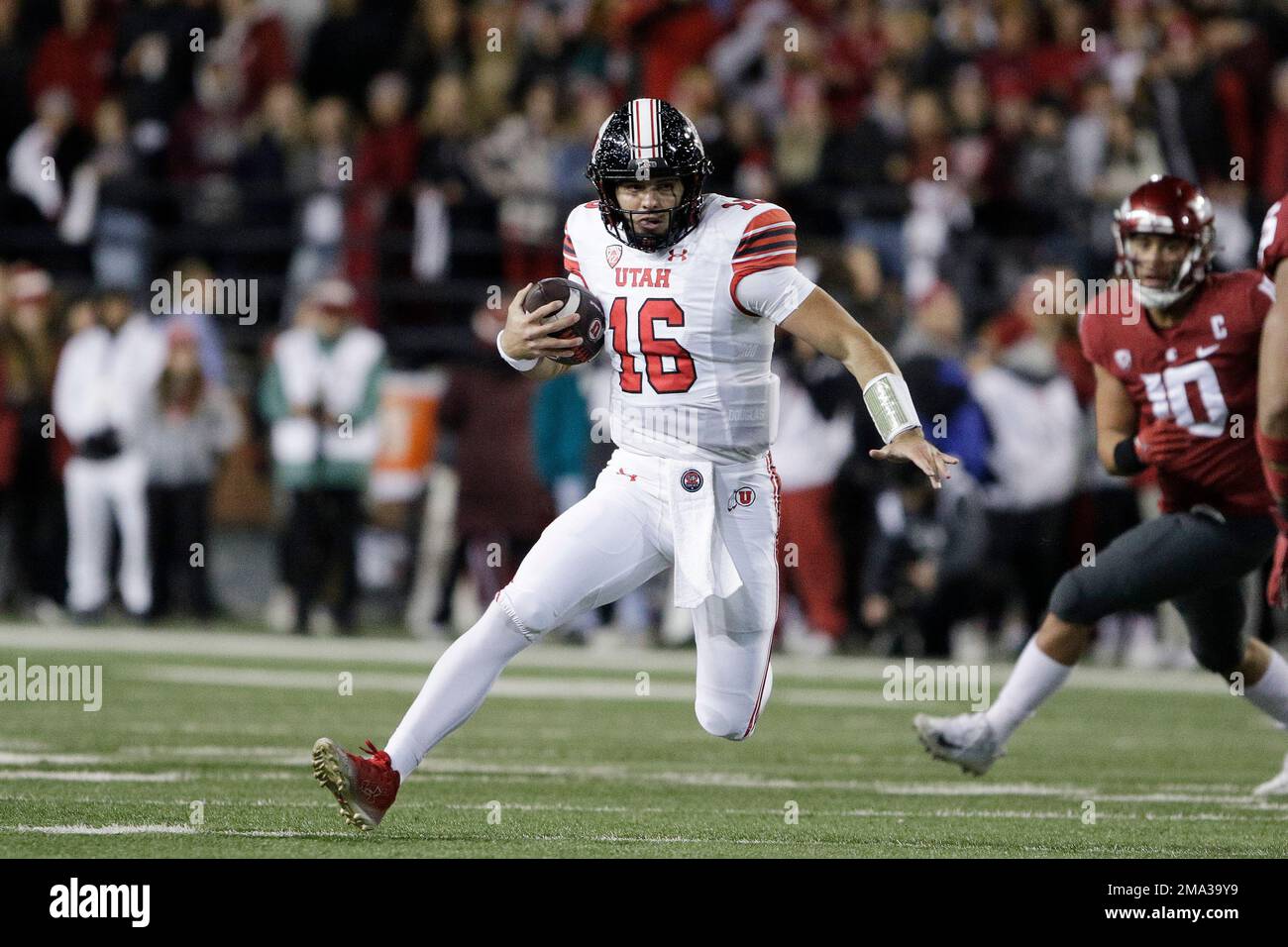 Utah quarterback Bryson Barnes (16) carries the ball during the first ...