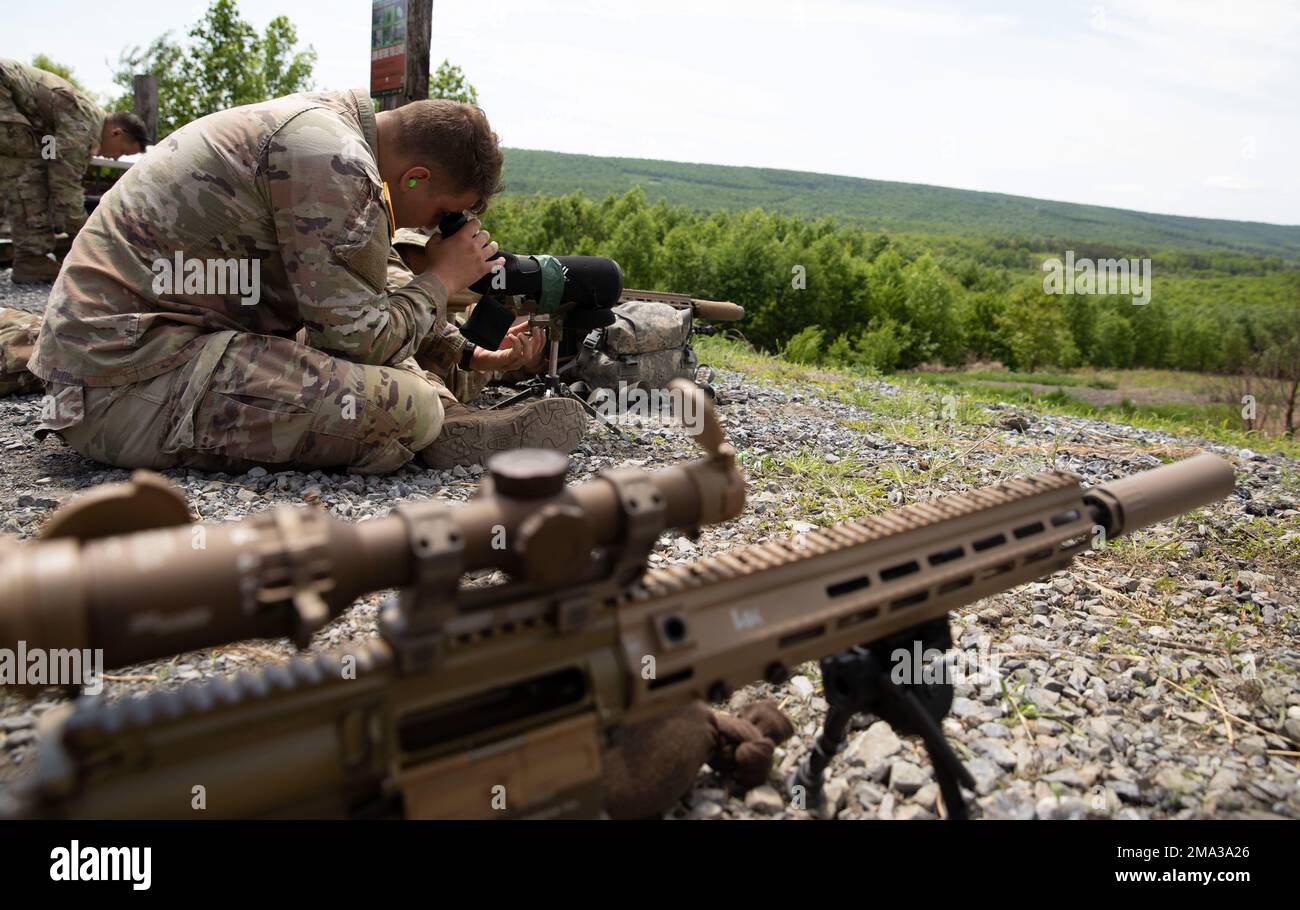 A spotter coordinates with the shooter during Squad Designated ...