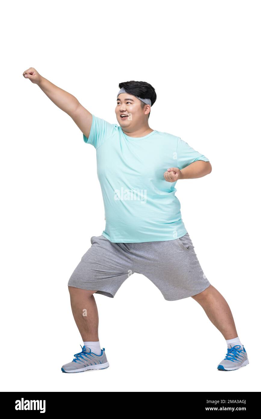 Fat young men in doing sports Stock Photo - Alamy