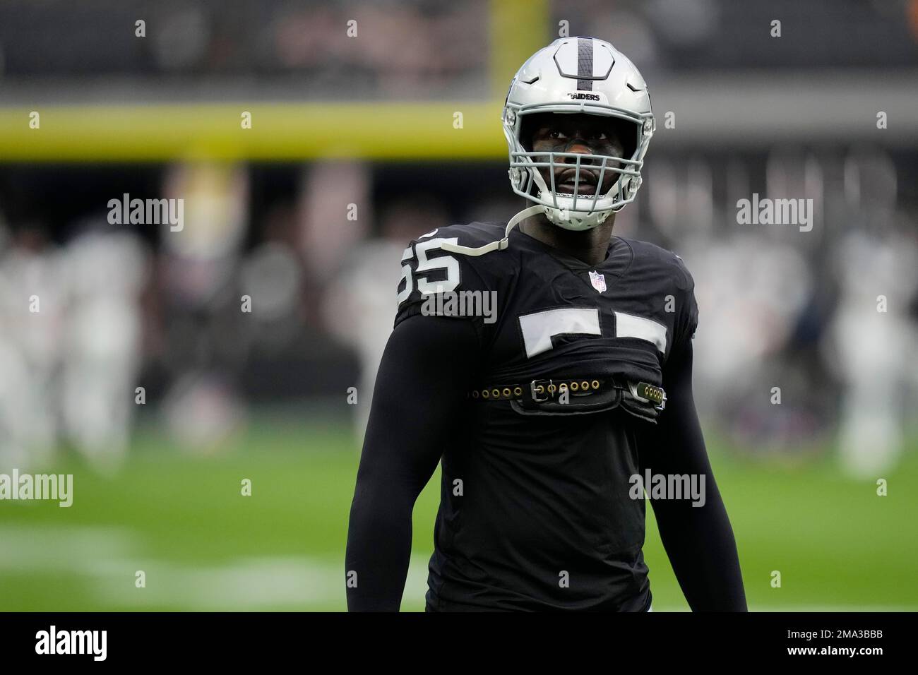 Las Vegas Raiders defensive end Chandler Jones (55) warms up before an ...