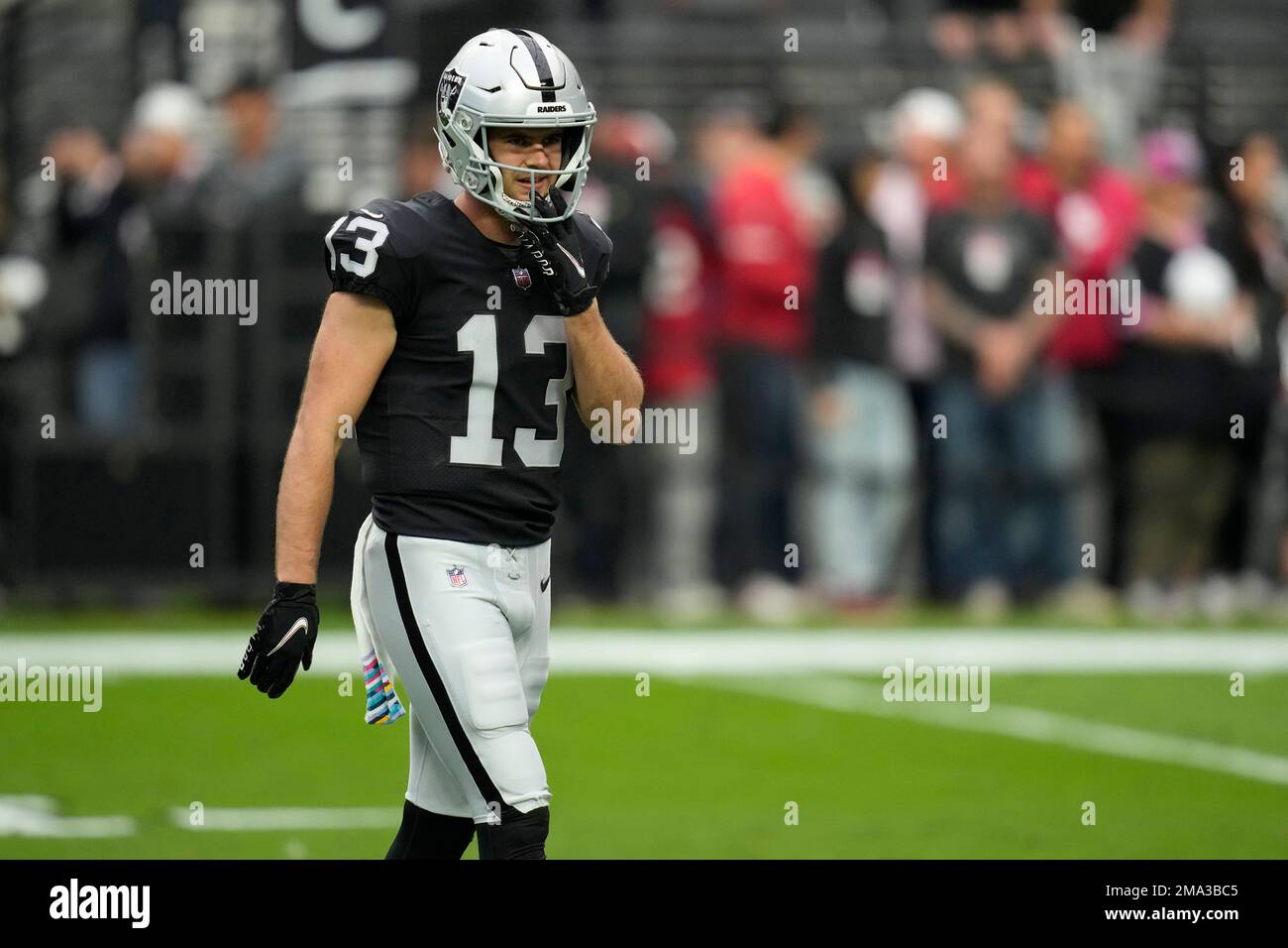 Las Vegas Raiders wide receiver Hunter Renfrow (13) warms up before an ...