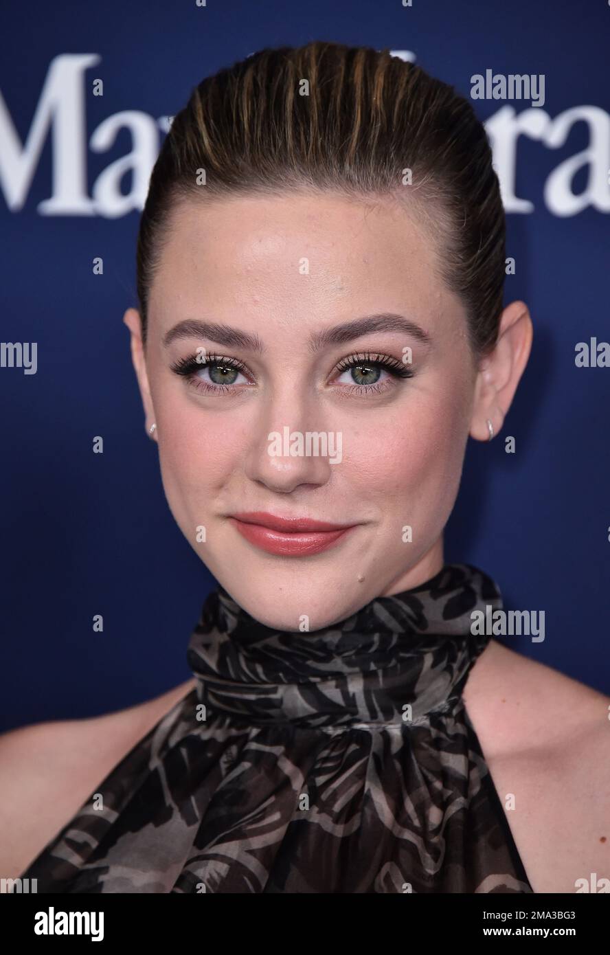 Lili Reinhart arrives at the 2022 WIF Honors, Thursday, Oct. 27, 2022 ...