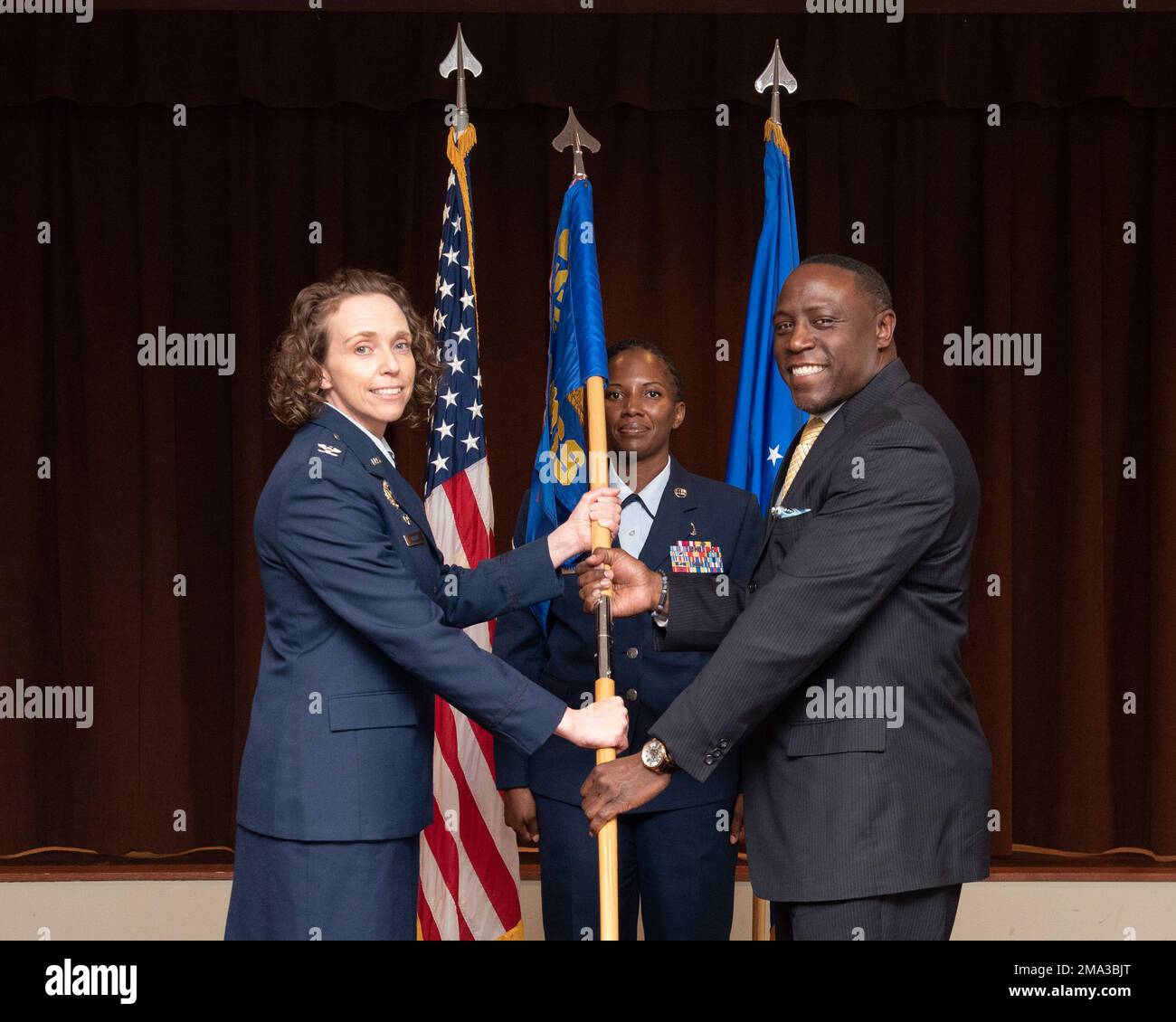 Col. Sirena Morris, 88th Mission Support Group commander, passes a ...