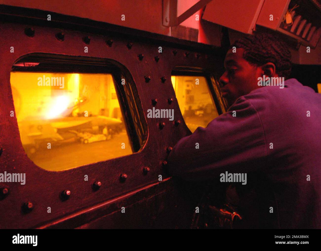 US Navy (USN) AIRMAN (AN) John Sumter mans conflagration station two ...