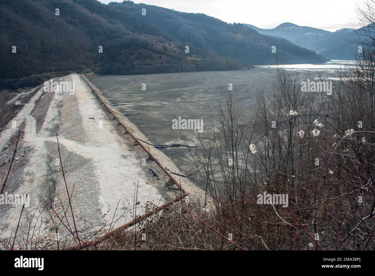 Barrier stopping the flow of copper and gold mining mining residuals ...