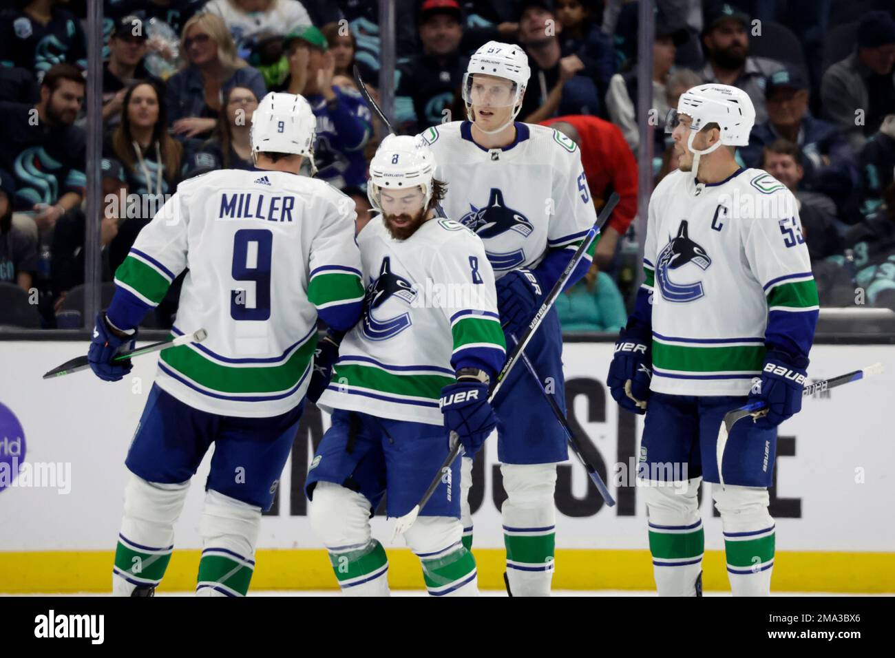 Vancouver Canucks right wing Conor Garland (8) celebrates his open goal ...
