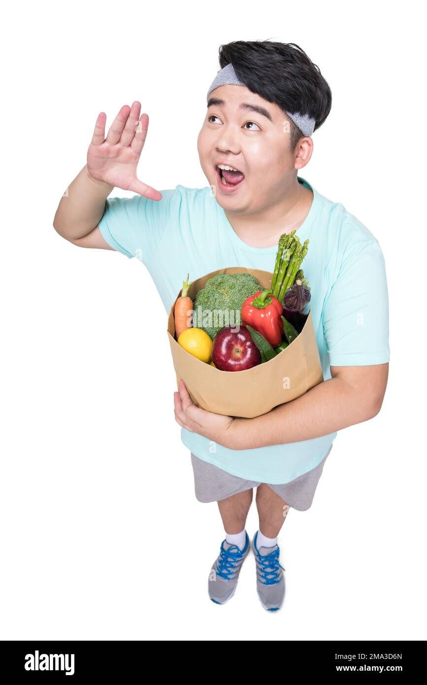 Obese young man with Hamburg Stock Photo - Alamy
