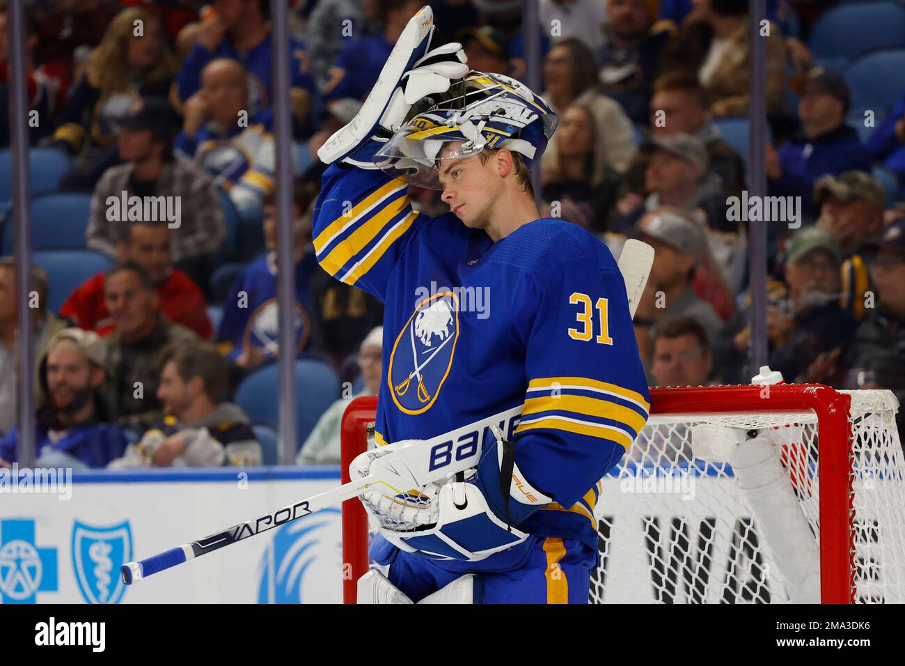 Buffalo Sabres goaltender Eric Comrie (31) looks on during the second ...