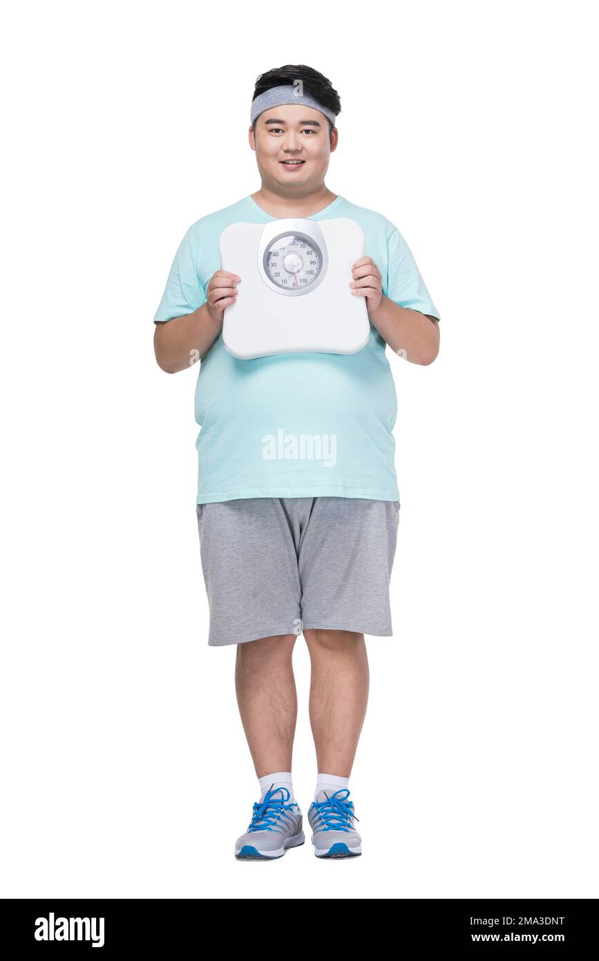 Fat man scales Cut Out Stock Images & Pictures - Alamy