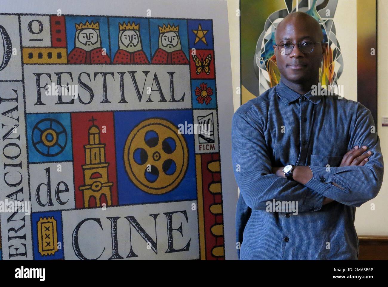 US filmmaker Barry Jenkins poses with a poster of the Morelia Film ...