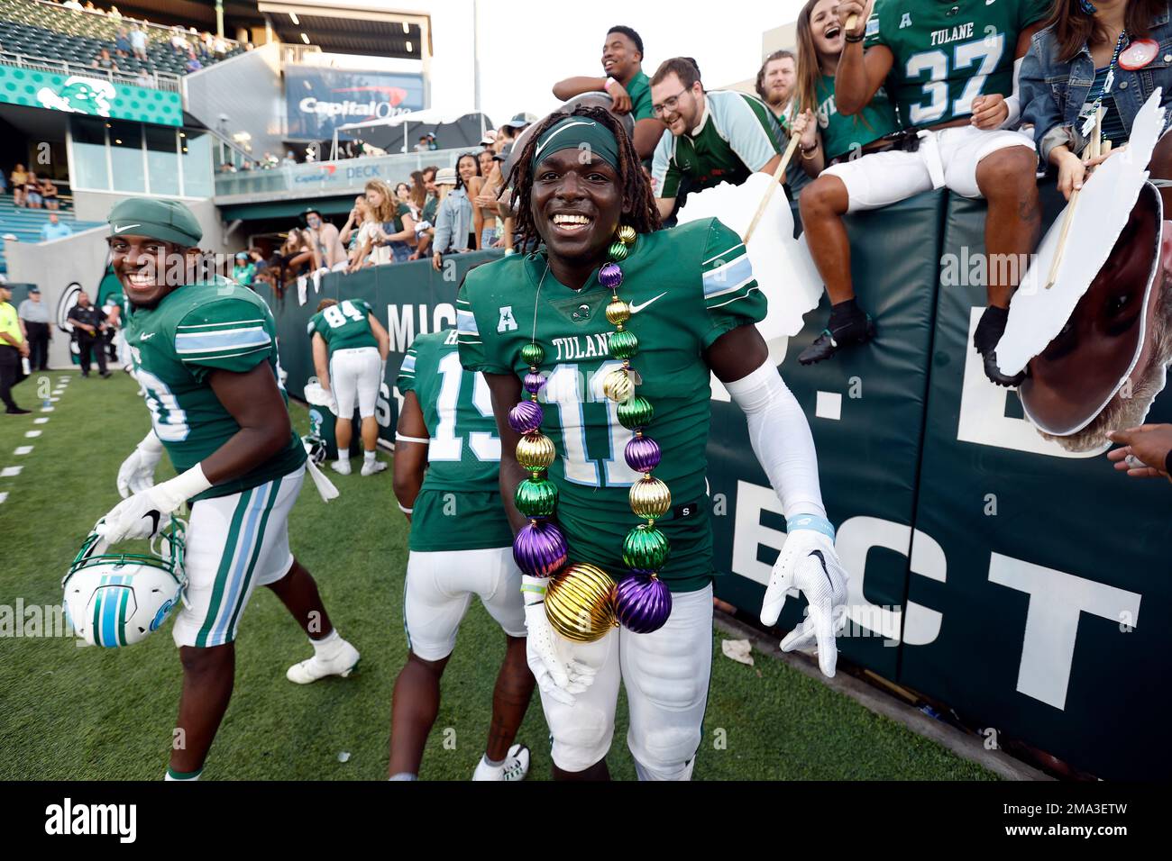 Tulane defensive back Jarius Monroe (11) celebrates after an NCAA ...
