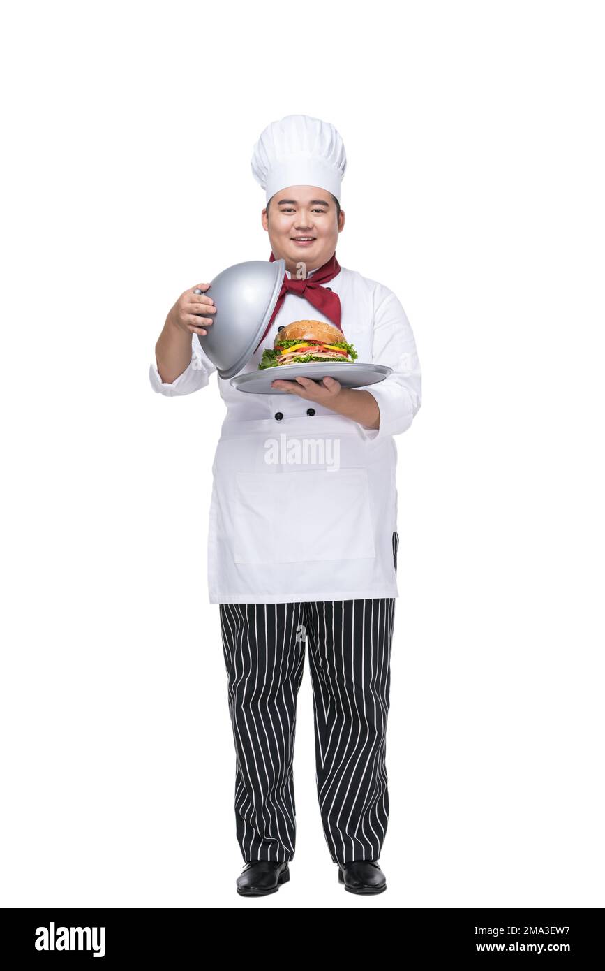 Happy asian cook Cut Out Stock Images & Pictures - Alamy
