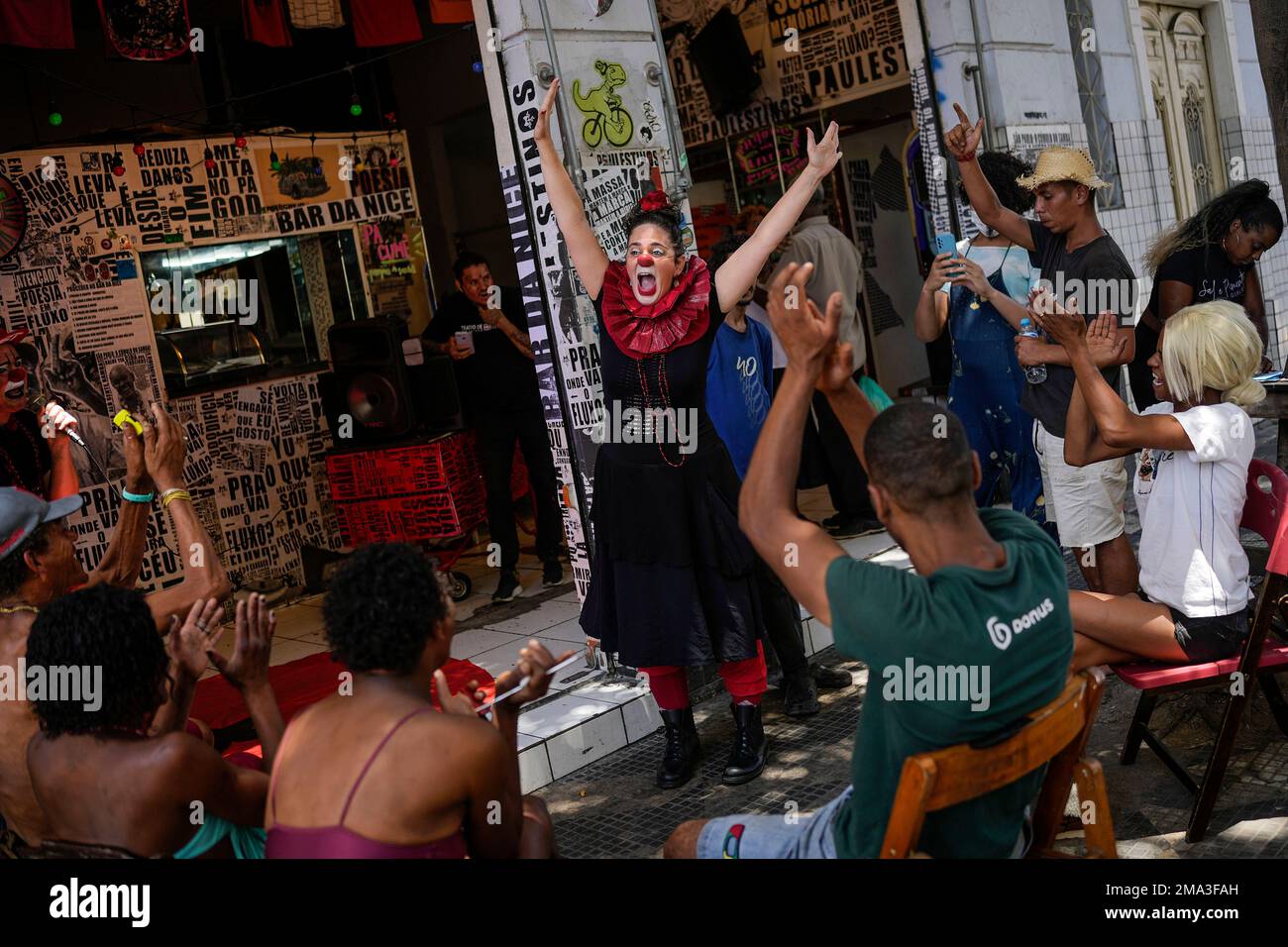 Andrea Macera, known as her clown character Mafalda, performs for the ...