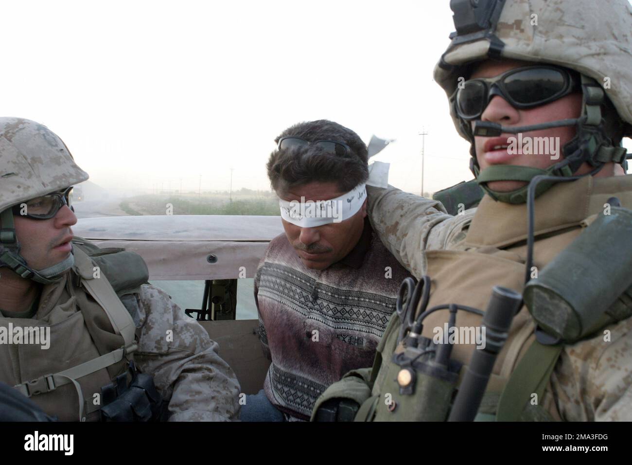 US Navy (USN) Hospital Corpsman Third Class (HM3) Eric B. Centeno and ...