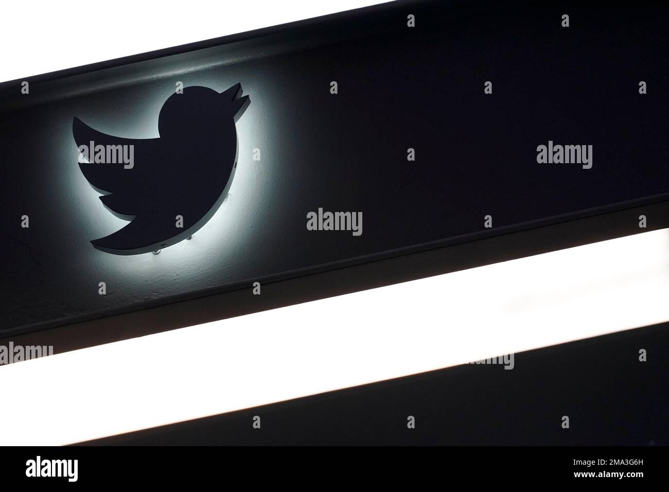 The Twitter logo is seen on the awning of the building that houses the ...