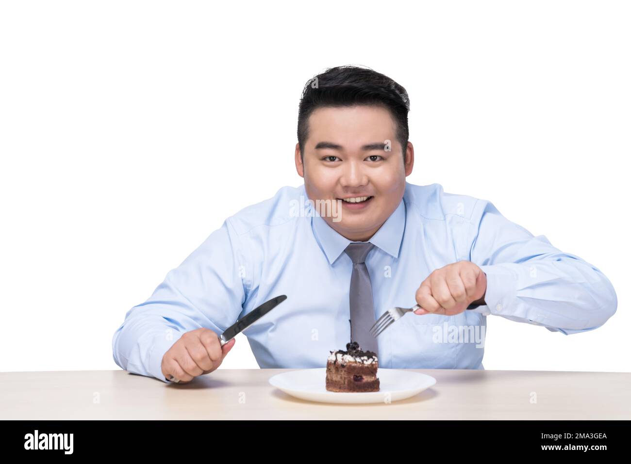 Fat people eat cake Stock Photo - Alamy