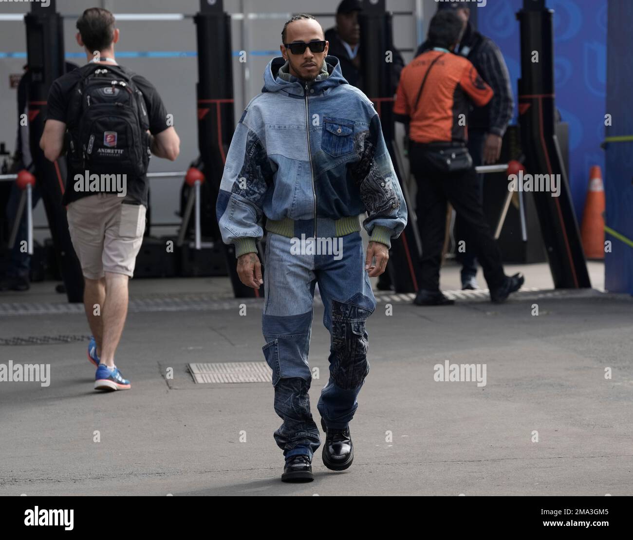 Mercedes driver Lewis Hamilton, of Britain, arrives for the first day ...