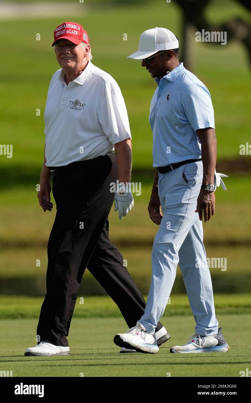 Former President Donald Trump, left, talks with Majed Al Sorour, CEO of ...