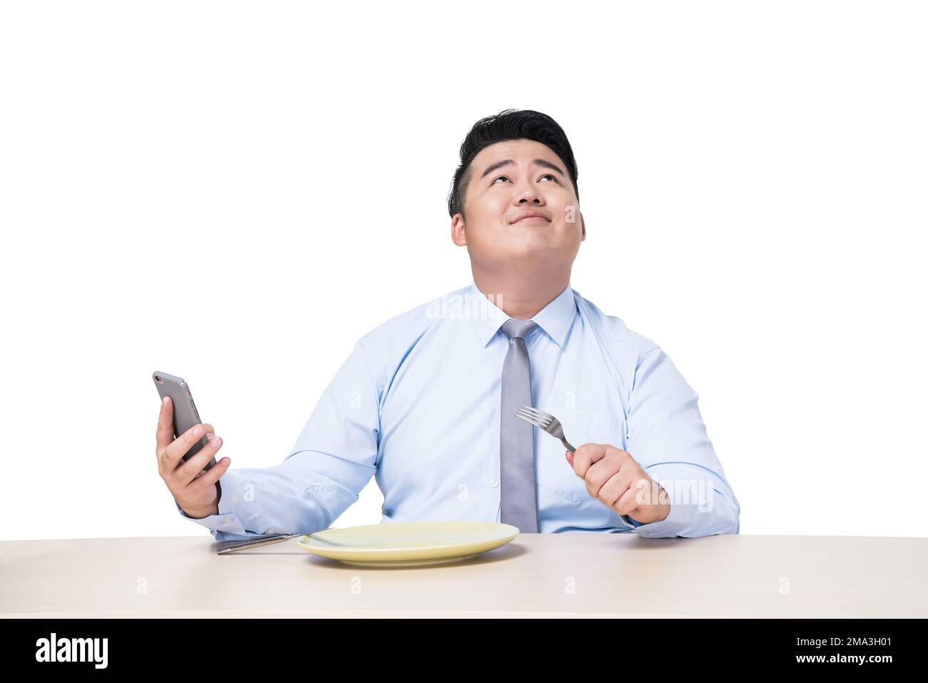 Fat people see mobile phone when you eat Stock Photo - Alamy