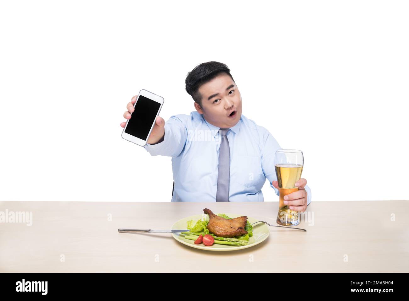 Fat people eat in with mobile phone Stock Photo - Alamy