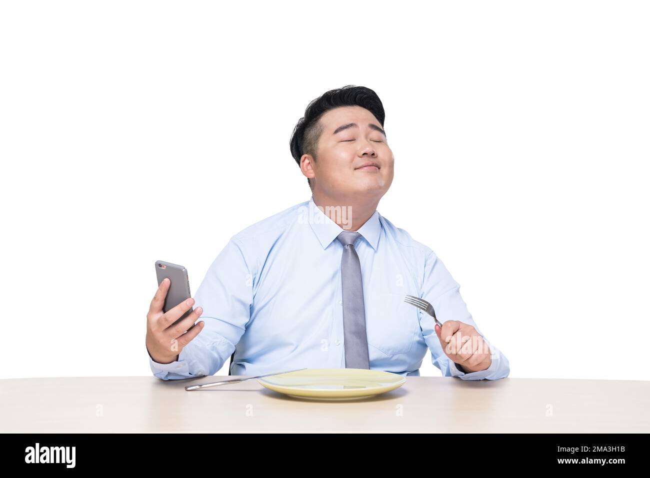 Fat people see mobile phone when you eat Stock Photo - Alamy