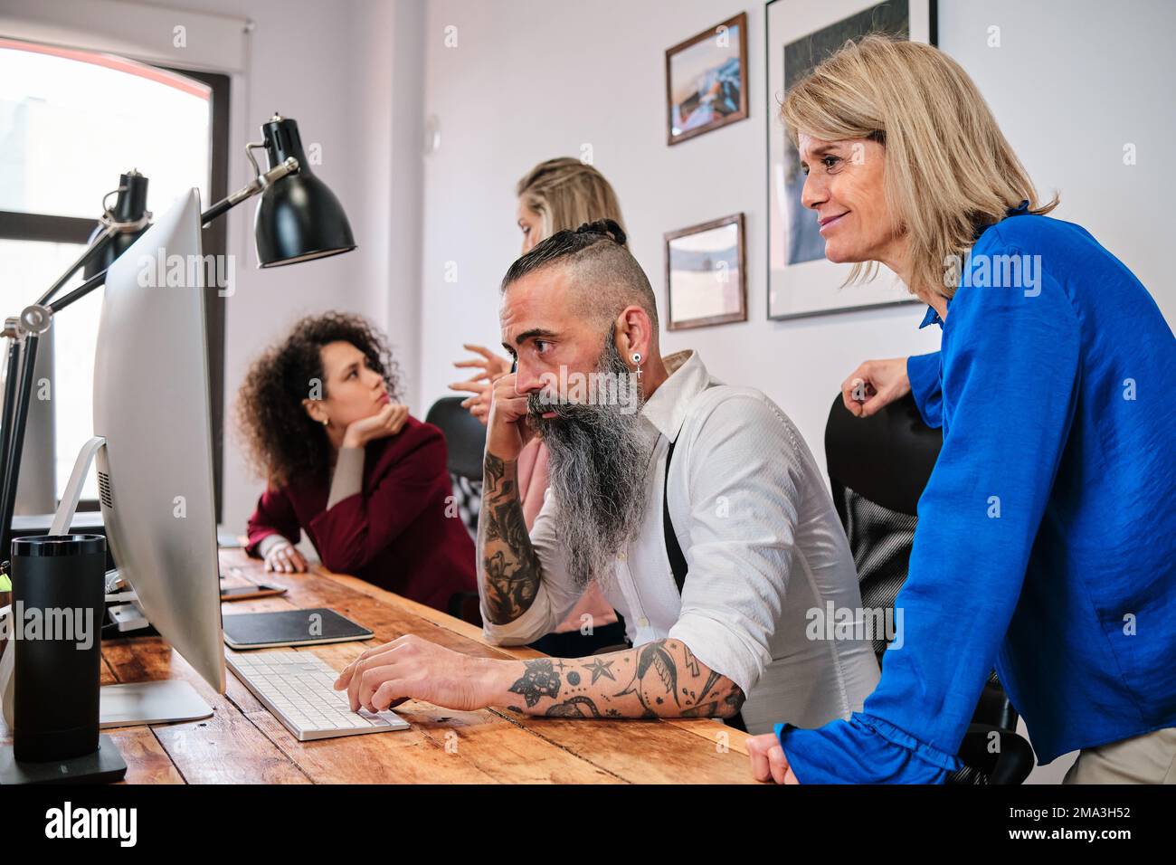 Professional group in coworking hi-res stock photography and images - Alamy