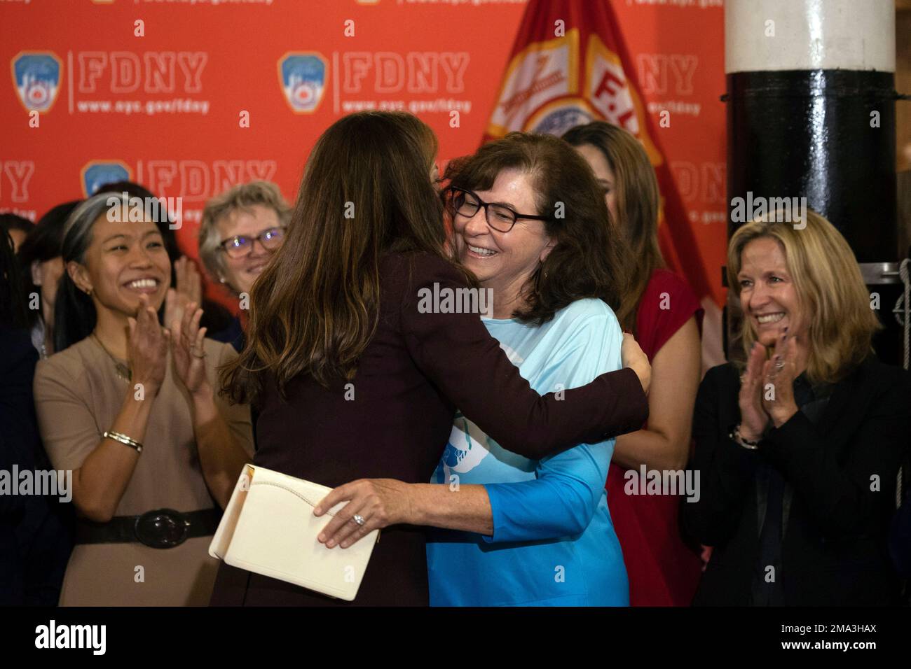 New York City Fire Commissioner Laura Kavanagh, left, embraces her ...
