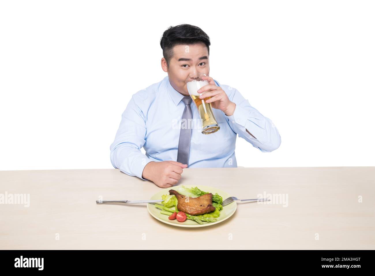Fat man eating dinner suit hi-res stock photography and images - Alamy