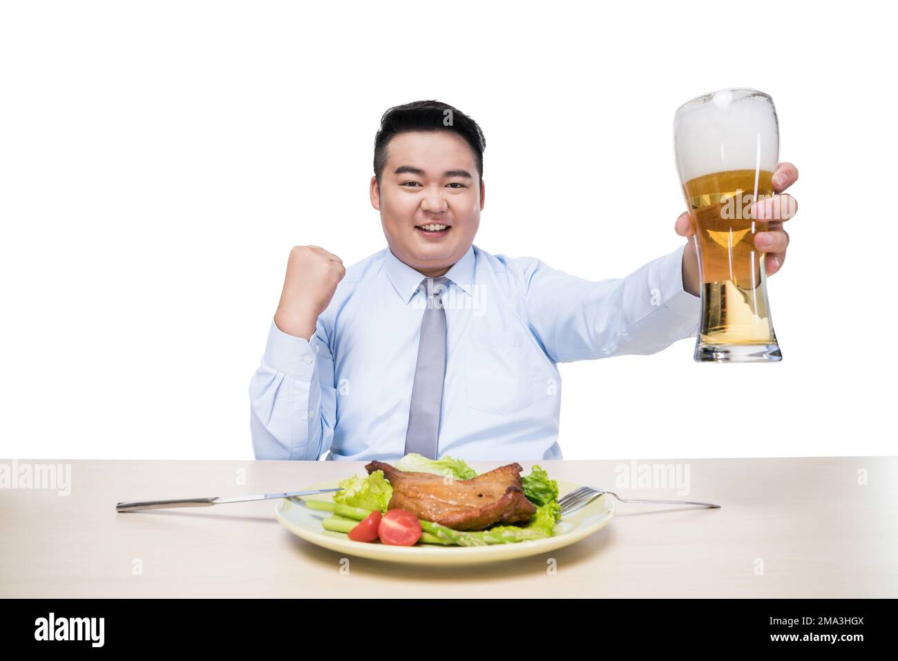 Fat man drinking beer at dinner Stock Photo - Alamy